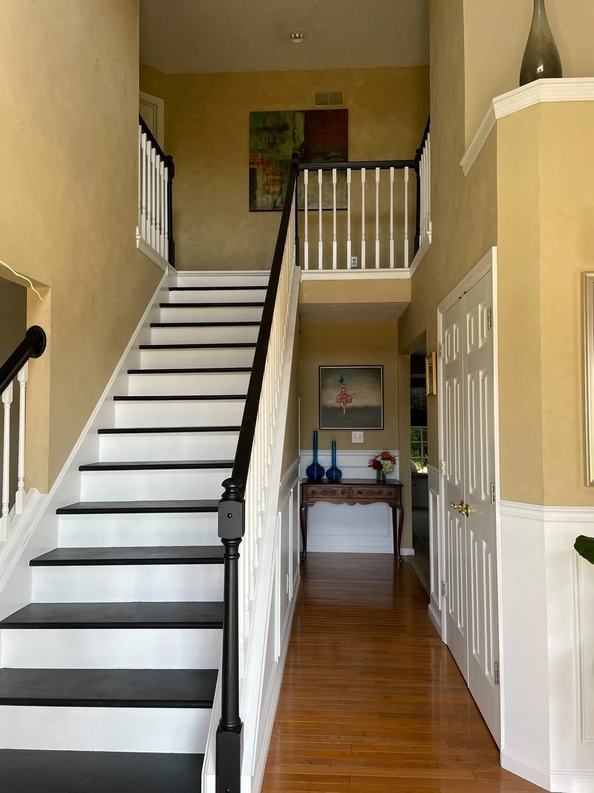 How to Decorate a Two Story Foyer with High Ledges and Window — DESIGNED