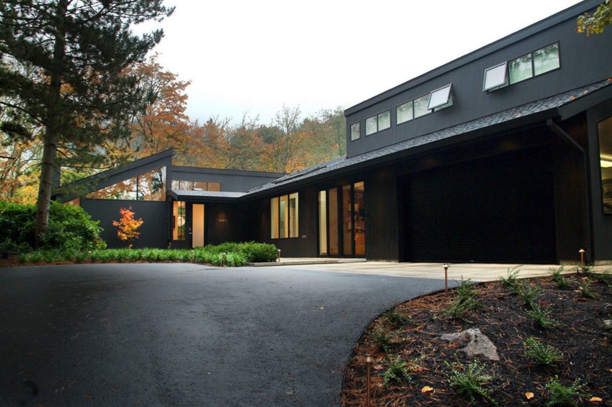An Office Building's Dated Exterior Colors Are Reborn Into A Dark ...