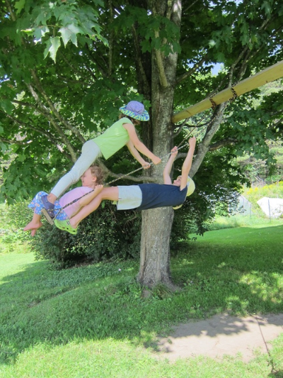 Kids on a swing — The Yellow Ladybird