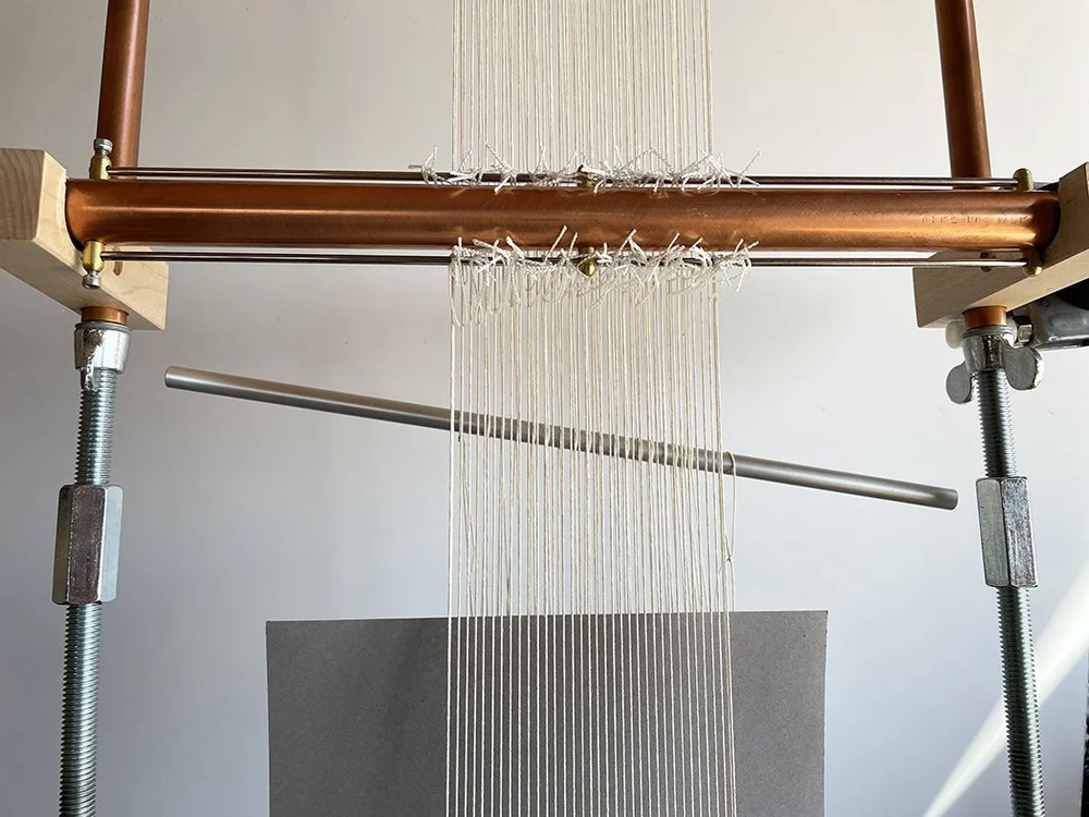 Tilting warping bar on a continuously warped loom like a Mirrix ...