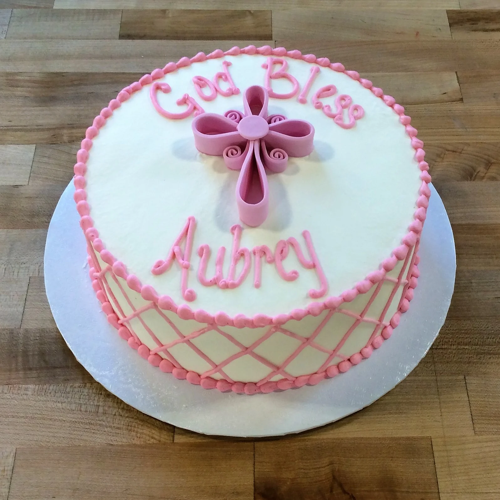 Cross Shaped Cake with Flowers — Trefzger's Bakery