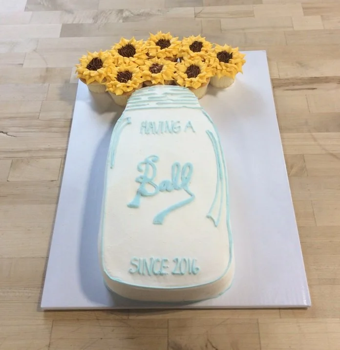 Mason Jar Shaped Cake with Flower Cupcakes — Trefzger's Bakery