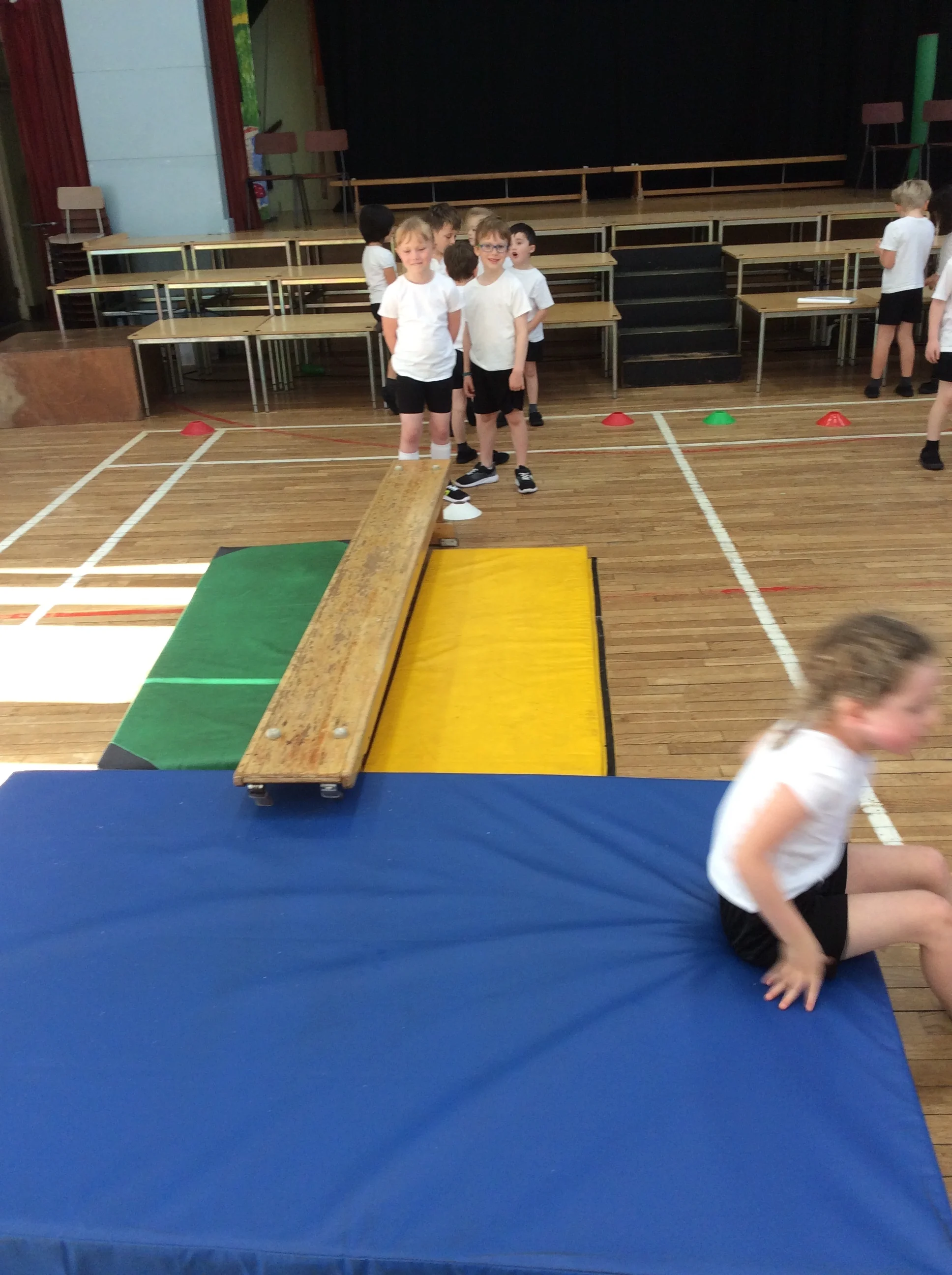 P2 are loving using the gymnastics equipment! — Holywood Primary School