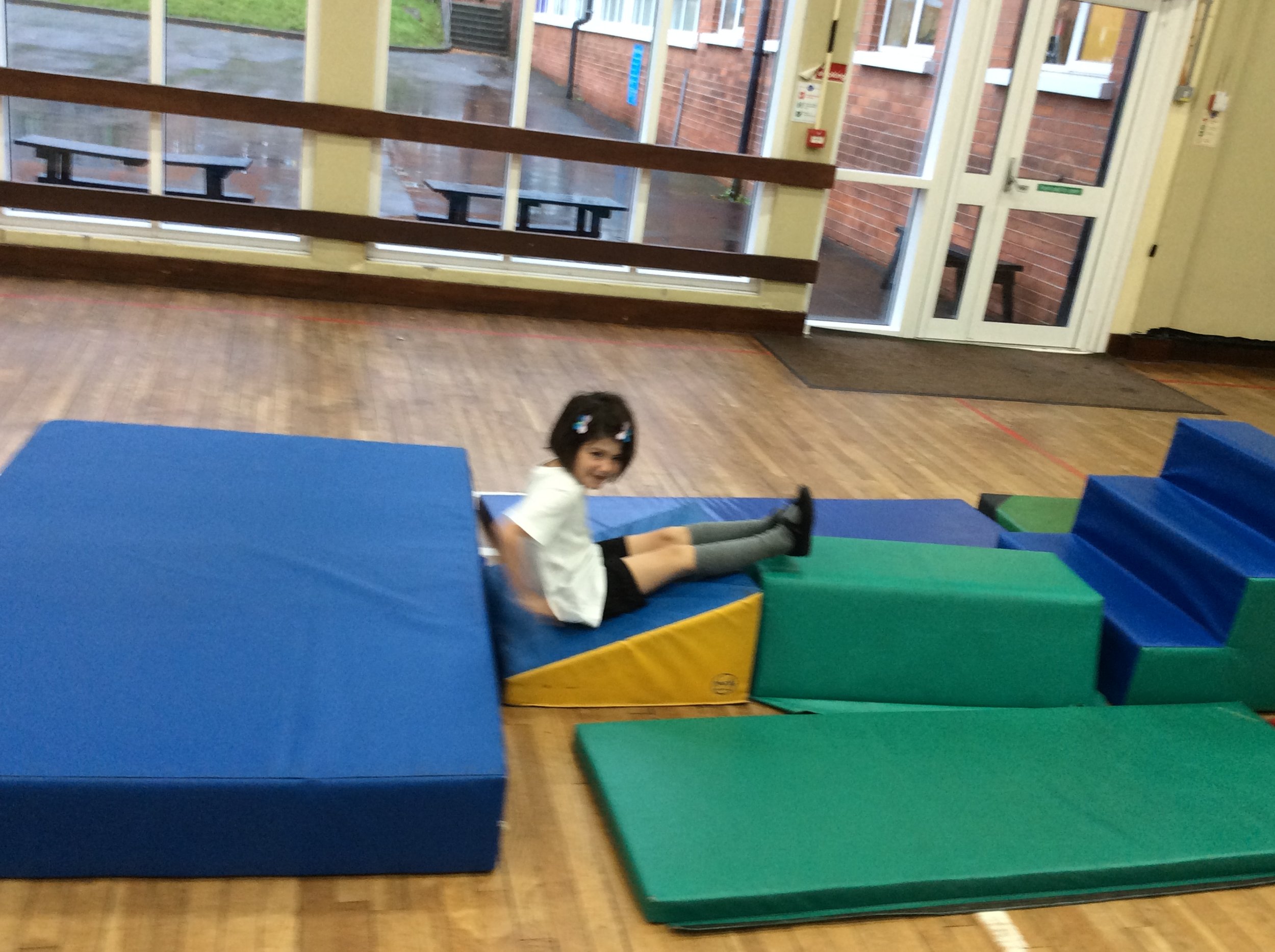 P2 are loving using the gymnastics equipment! — Holywood Primary School