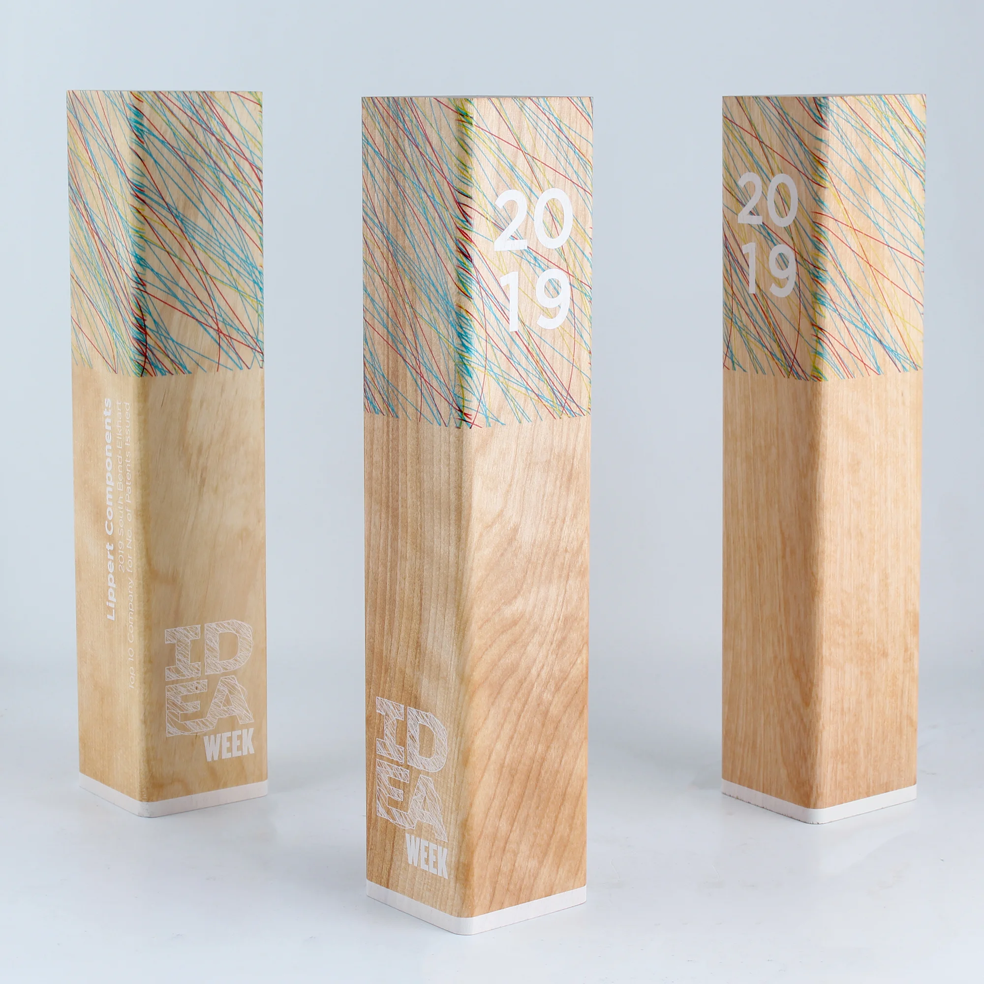 custom trophies and awards under $ 200 — andrew watson design