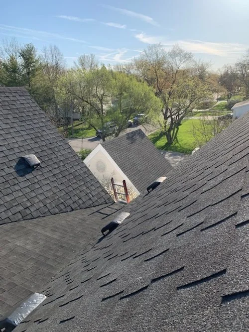 Roof Saddle Construction to Repair Roofing Leaks & Ventilation | Ann Arbor