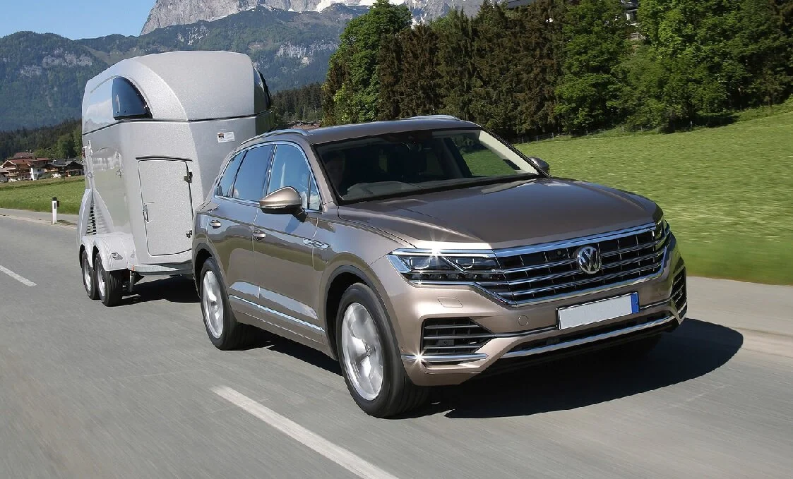 Weight distribution and load-levelling hitches