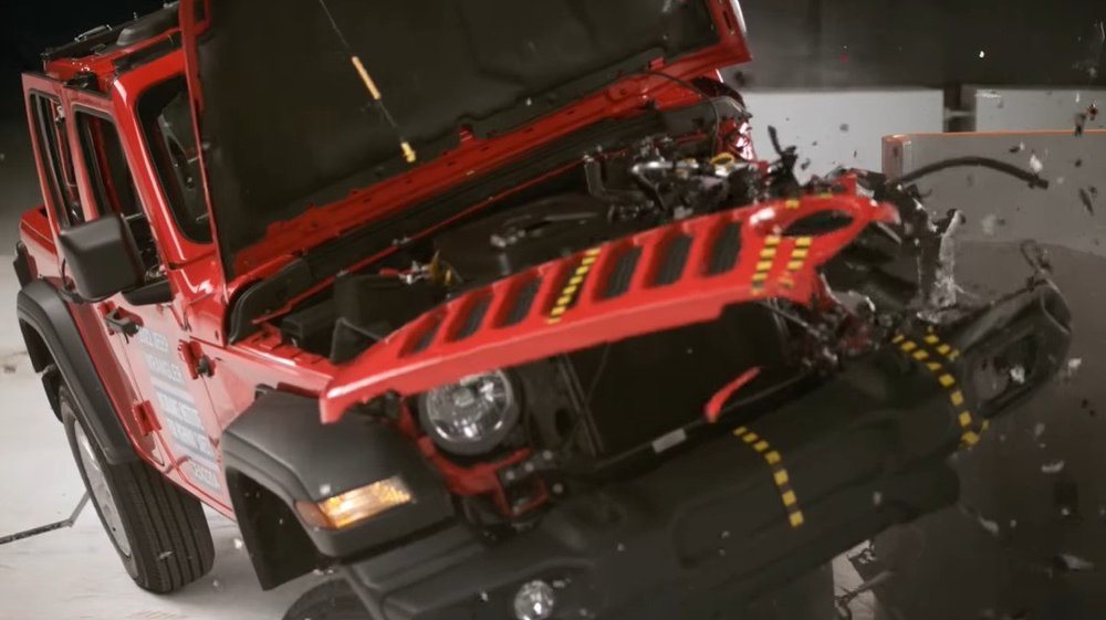 ROLL CENTRE: Jeep Wrangler flips over in official IIHS crash test - again