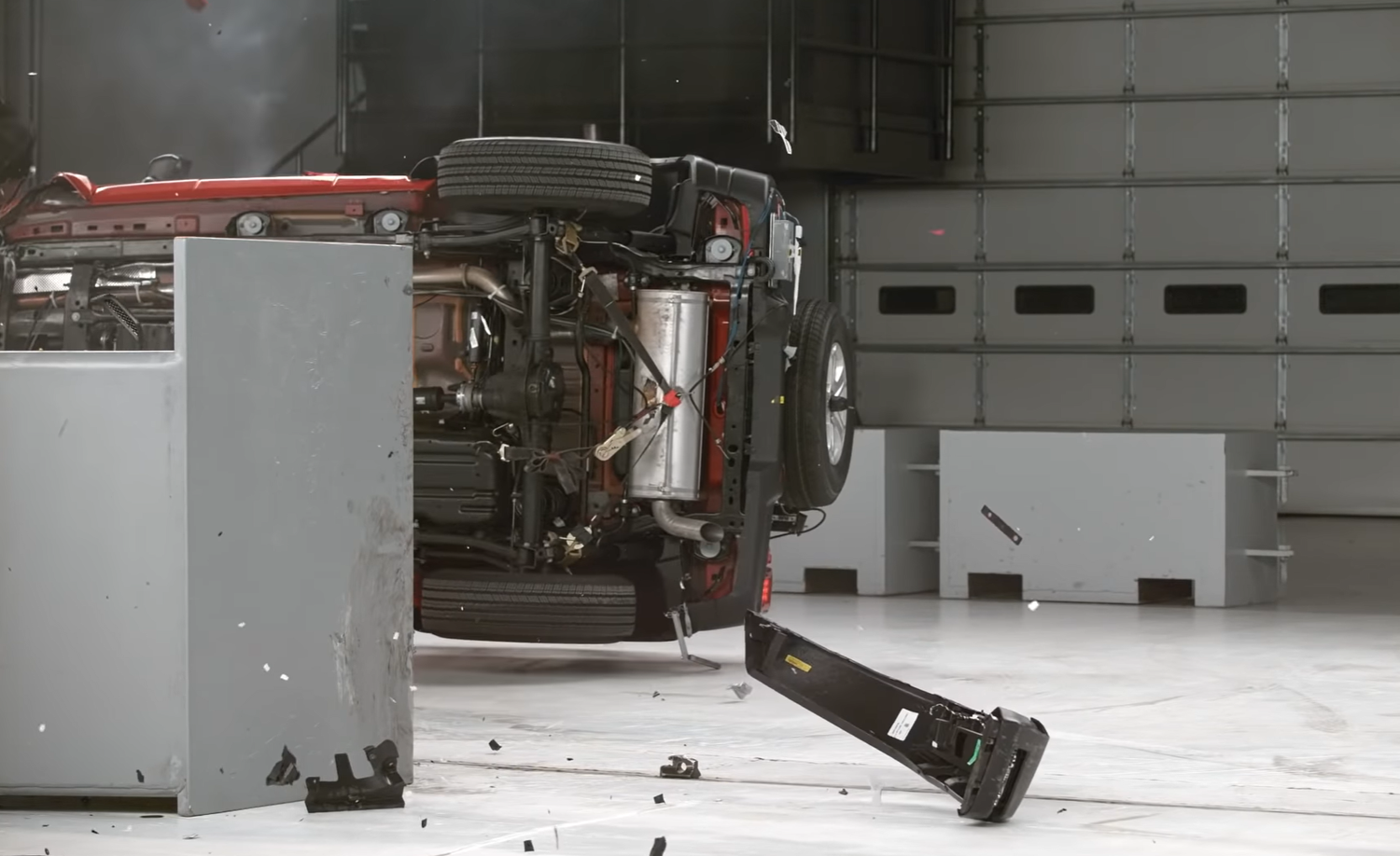 ROLL CENTRE: Jeep Wrangler flips over in official IIHS crash test - again