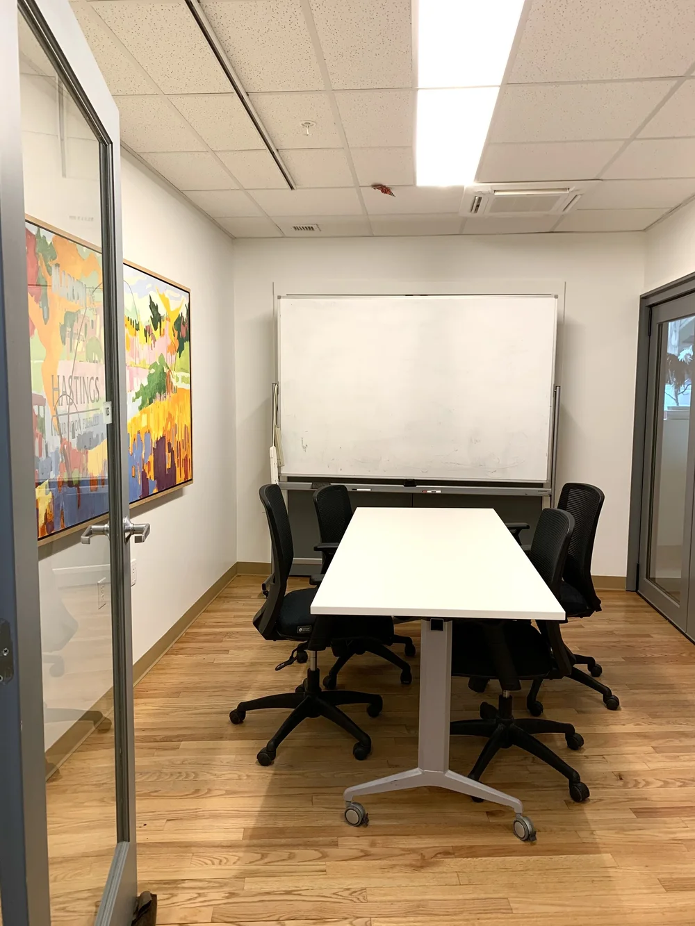 Hastings Meeting Room — >>Click Workspace