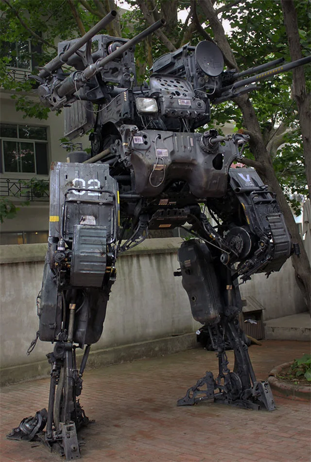 Incredible 12-Foot Mech Sculpture Made of Car Parts — GeekTyrant