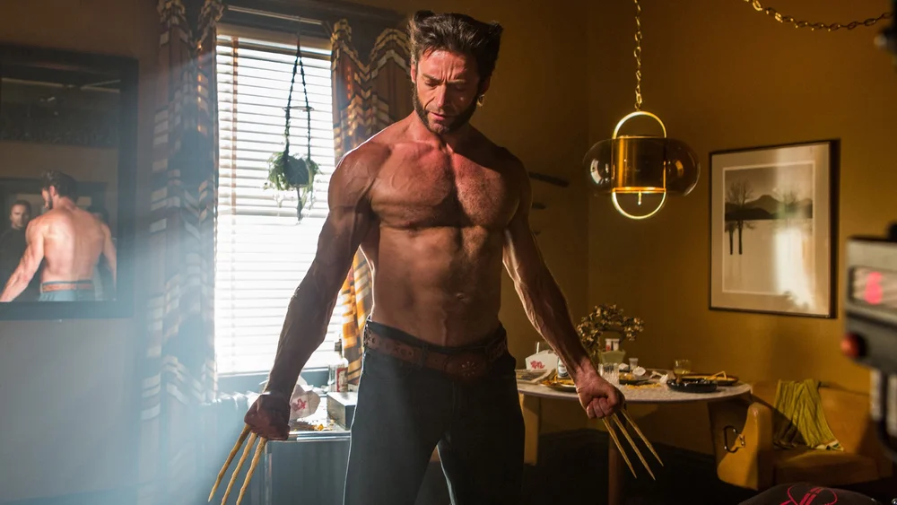 Two New Images from LOGAN Tease Violence and a Mysterious Character ...