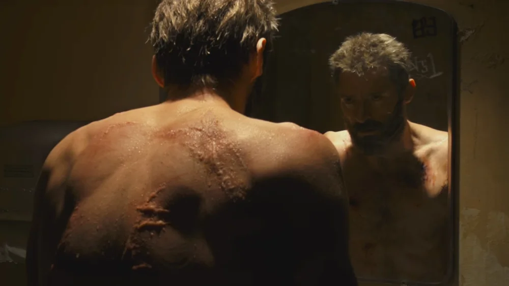 Explanation of Why Wolverine Has Scars in LOGAN and Why Johnny Cash's ...