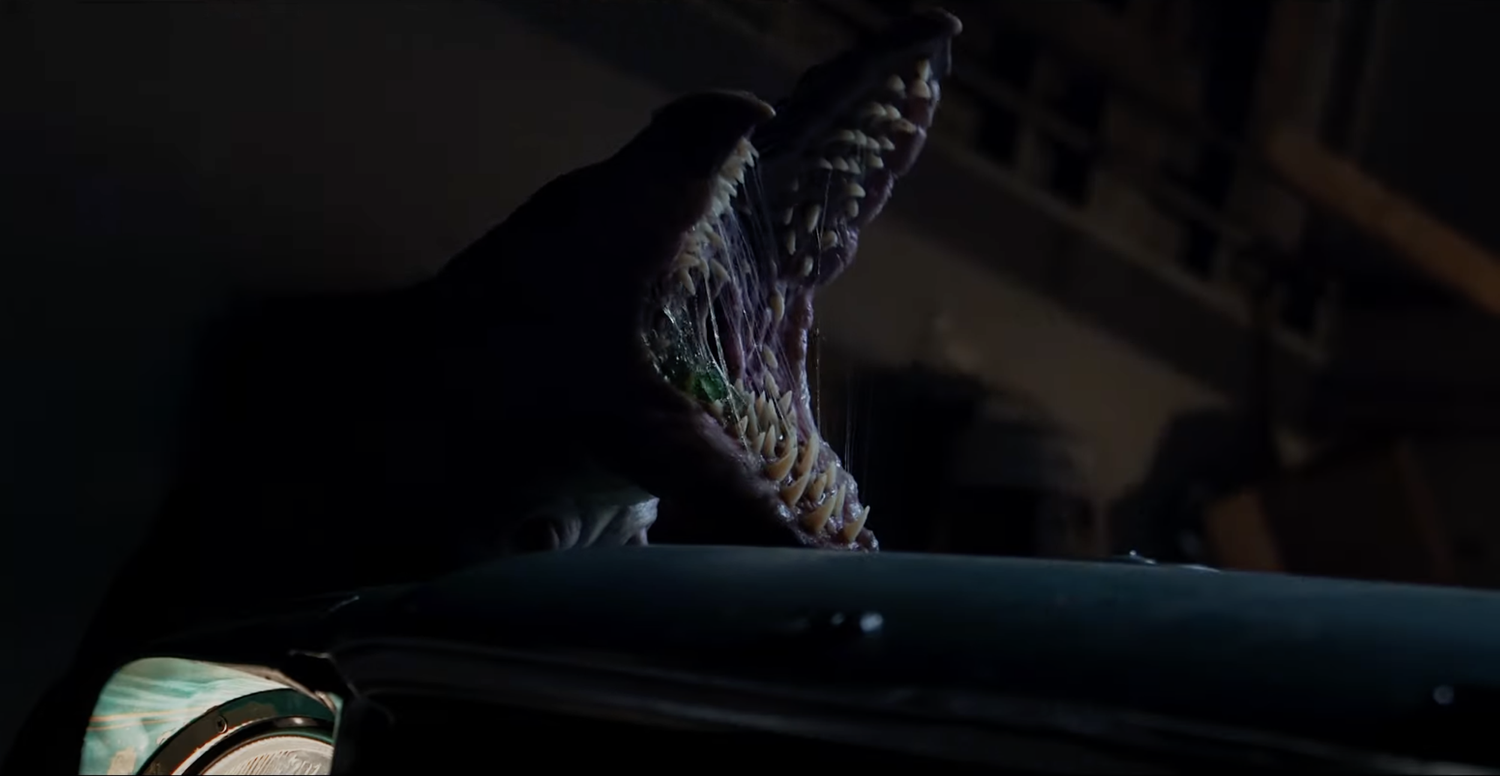 A Man Trapped in a Garage Fights a Worm-Like Monster in Trailer for the ...
