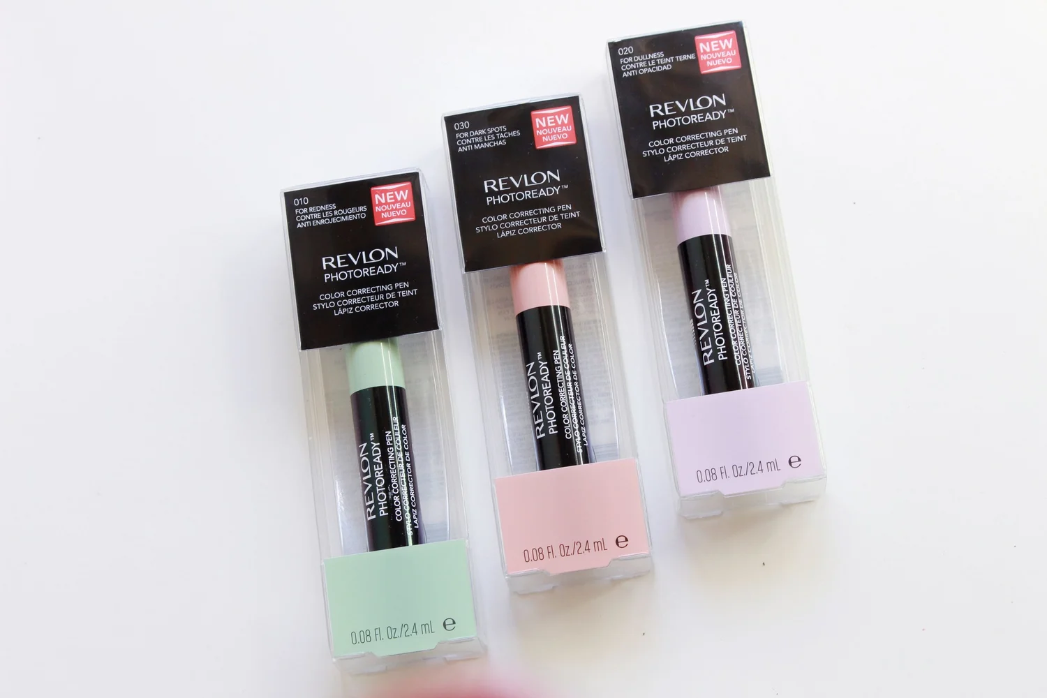 This is what green, lavender, and peach color correctors are for ...