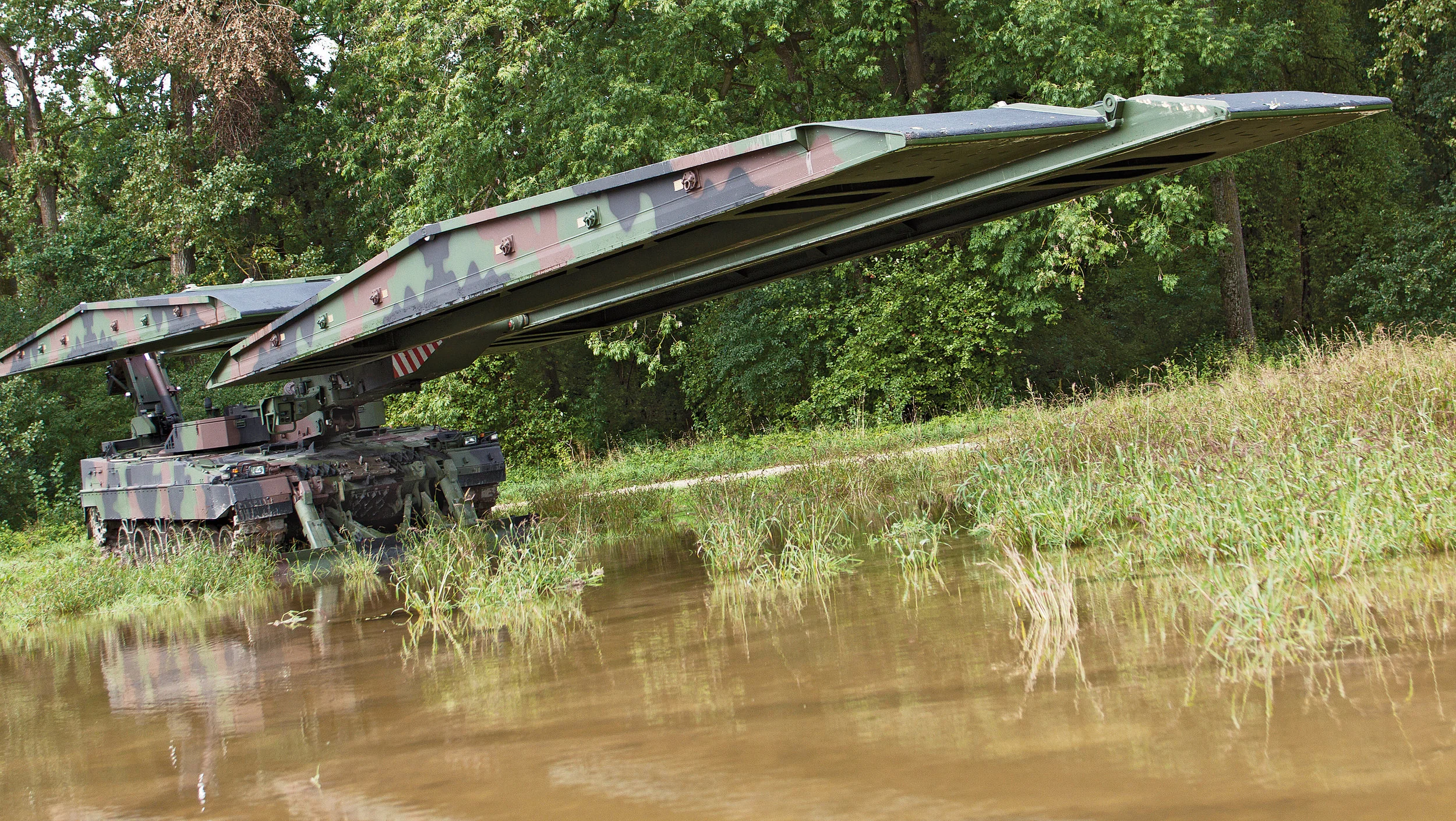 MOBILITY KEY IN ASYMMETRICAL WARFARE: KMW's Leguan Bridge Layer ...
