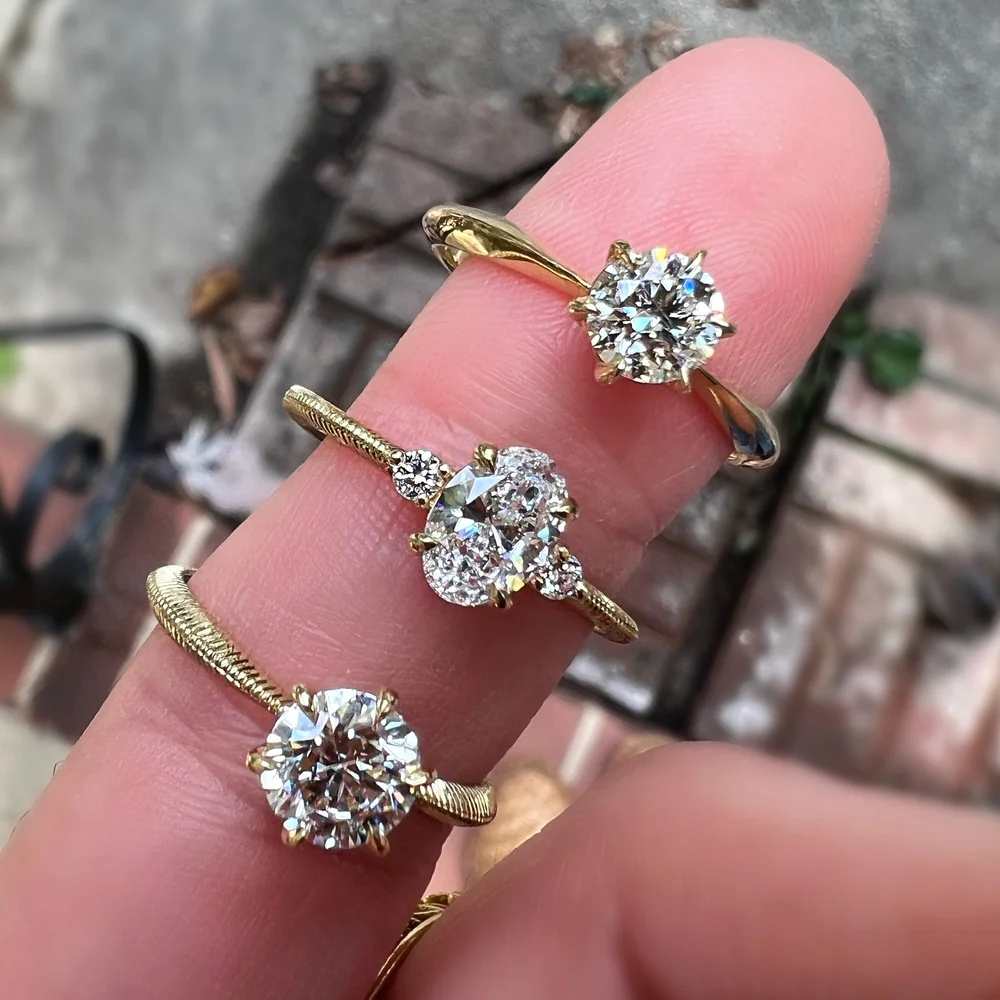 Round Engagement Rings On Hand