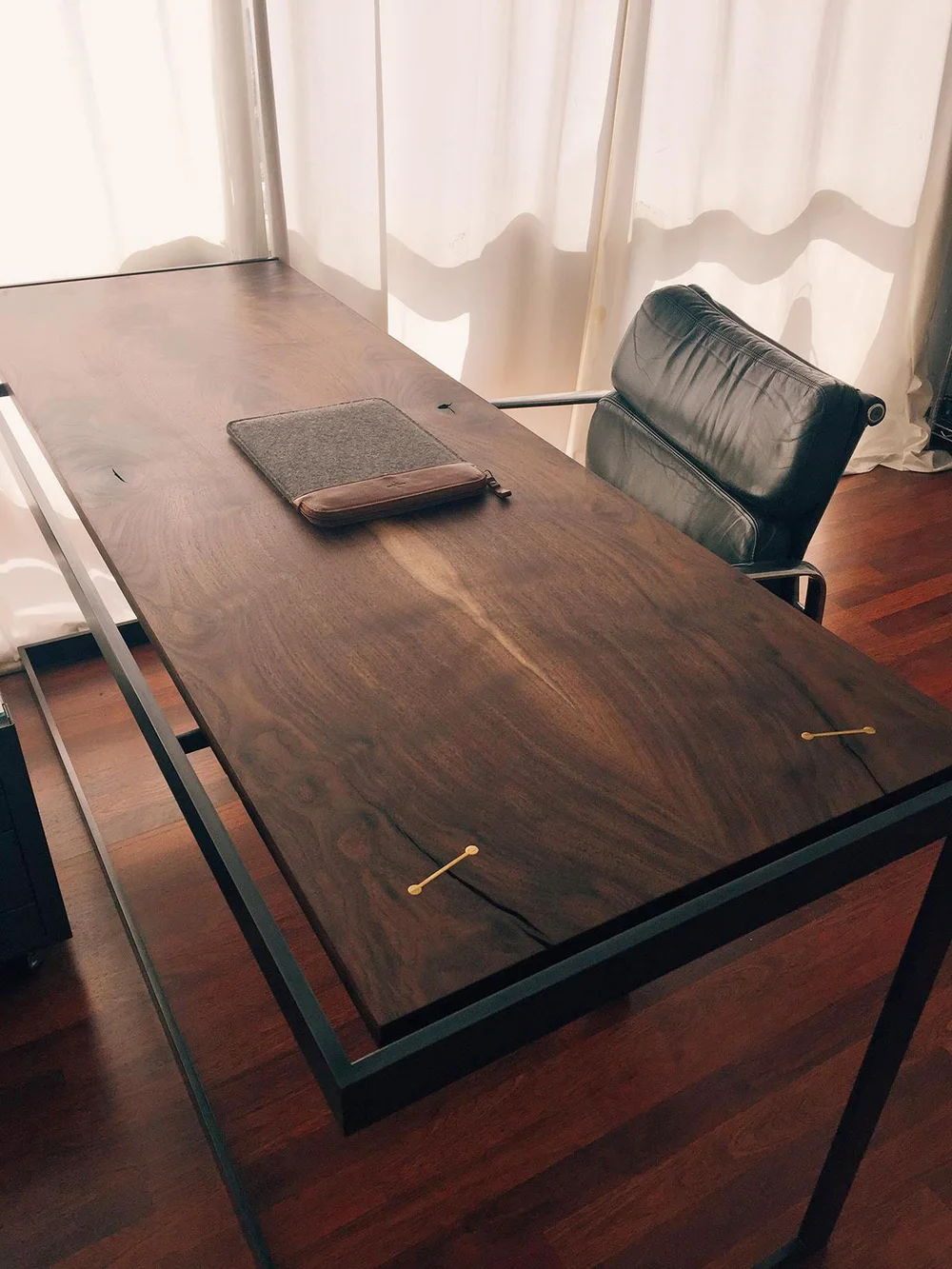 Suspended Desk Featuring Book Matched Claro Walnut and Corsets ...