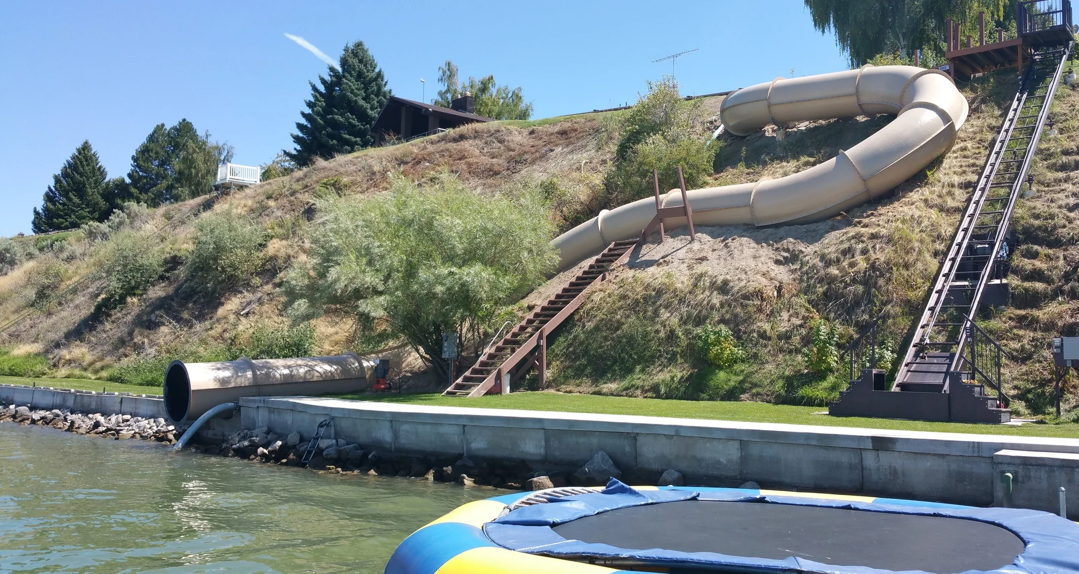 Riding Down Huge Tube Slide on a Towable Tube — fixmyslide.com