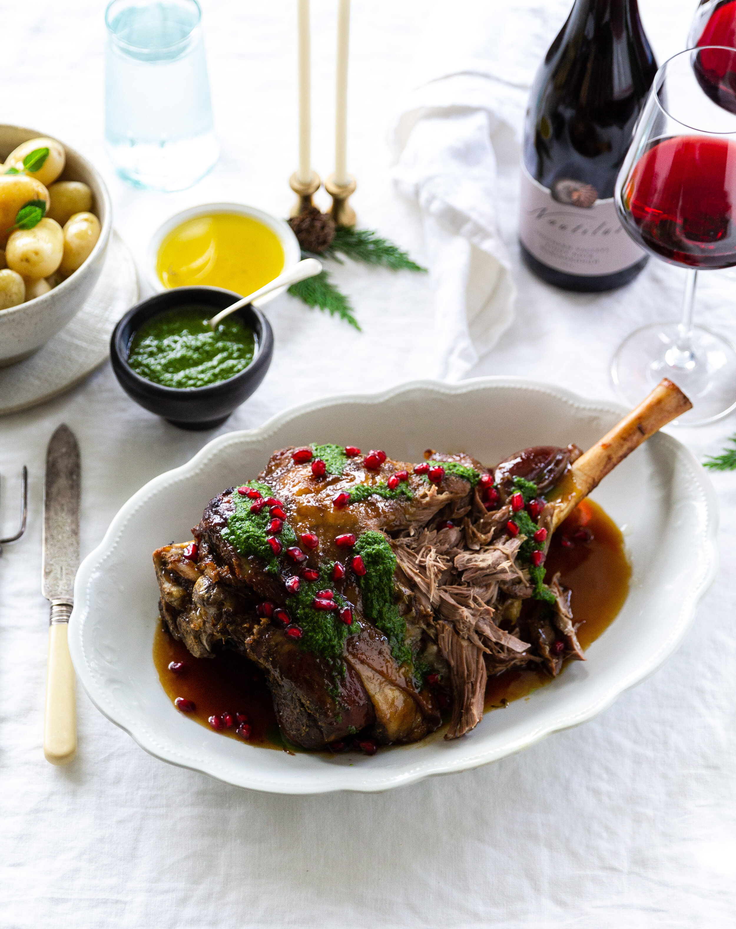 Spiced slow-roasted lamb leg w/ herb sauce and pomegranate seeds ...