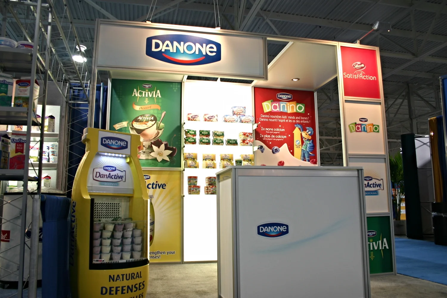 Danone — Exhibit Solutions Inc.