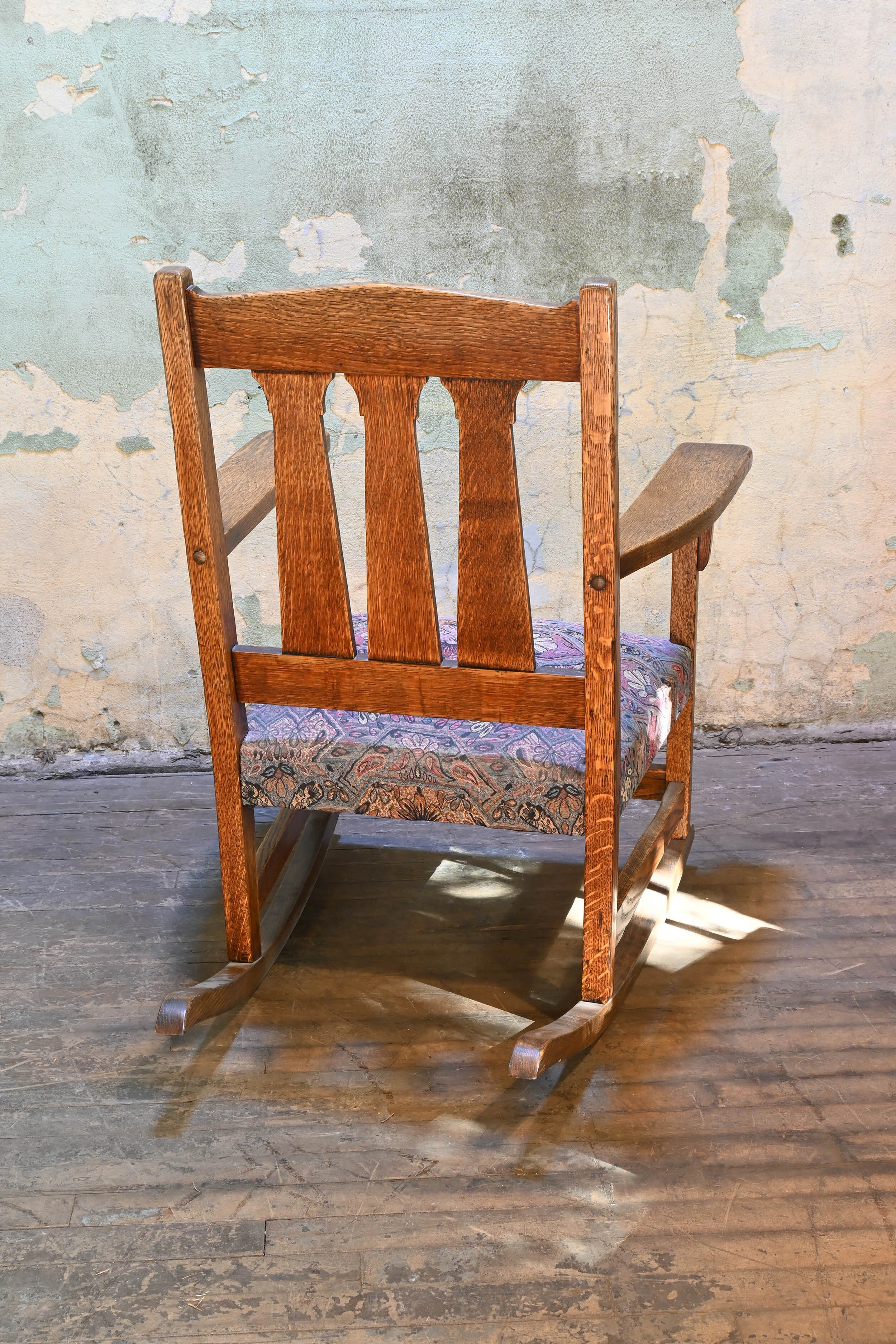 antique oak rocker with purple floral upholstery — ARCHITECTURAL ANTIQUES
