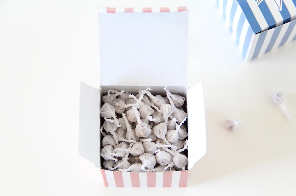 POP-ITS PARTY FAVORS — And We Play