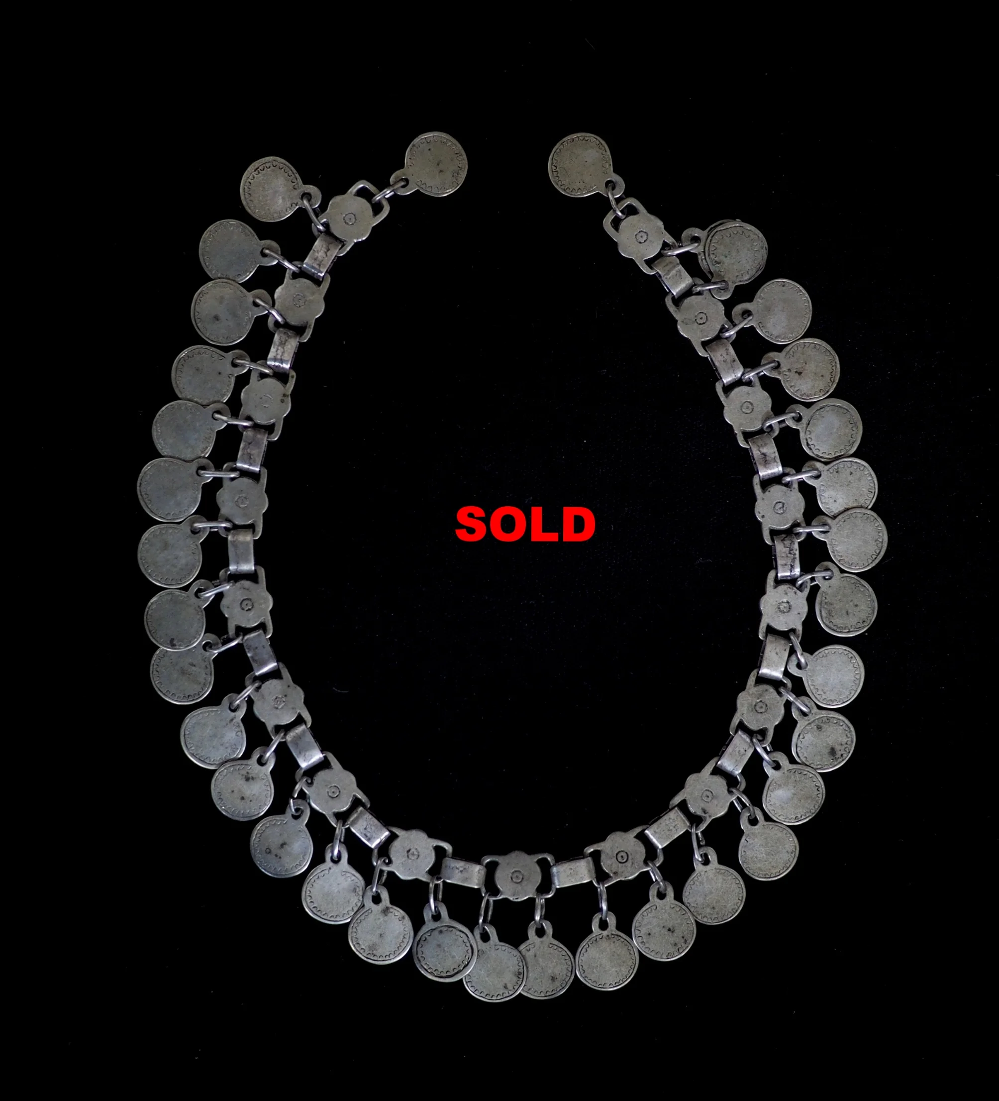 Mapuche silver head ornament / necklace. Chile. — Karlsson | Wickman