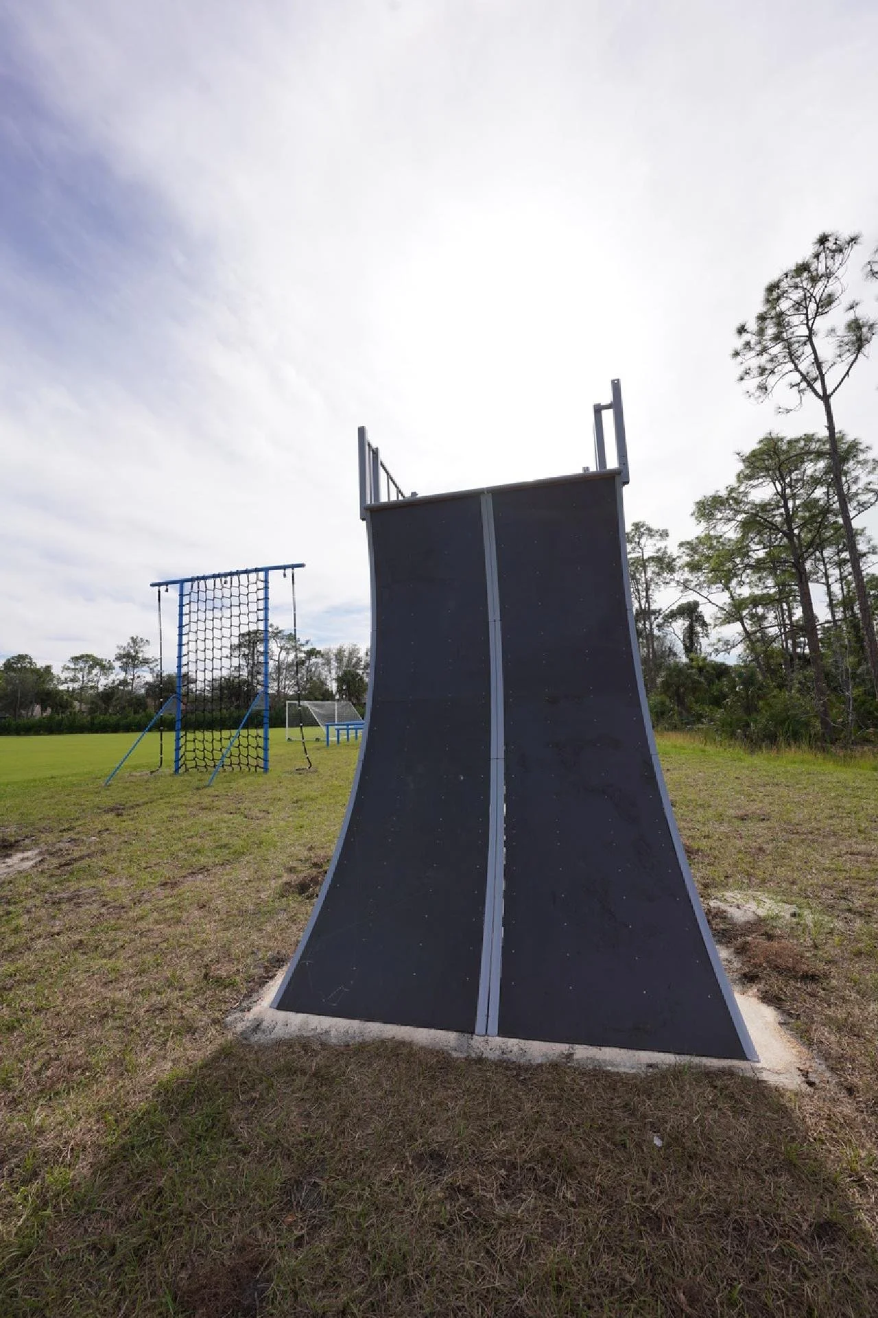 Conquer the Challenge: Dual Warped Wall with Cargo Net - MoveStrong