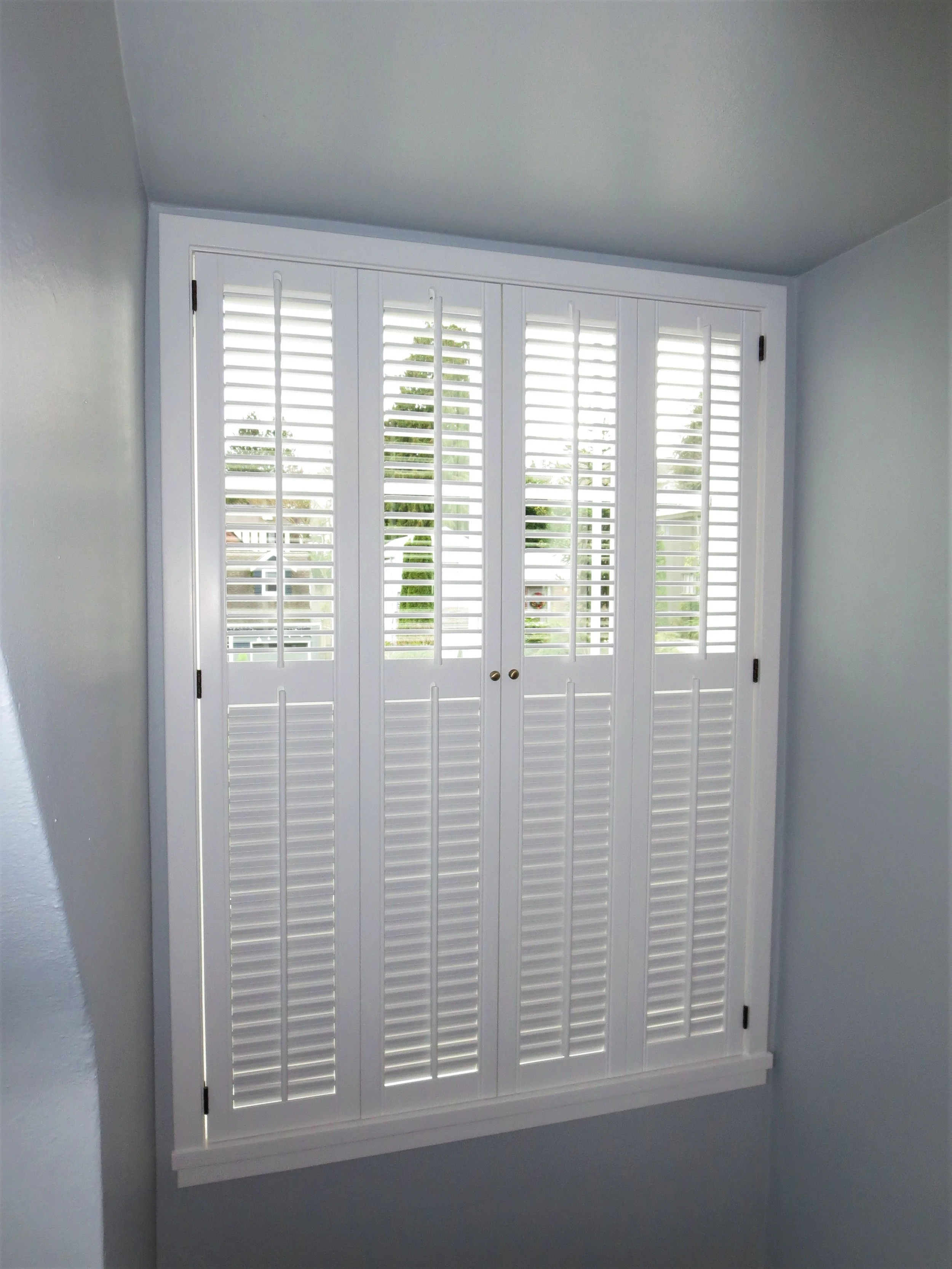 Accommodating trim-less windows — Newport Custom Shutters