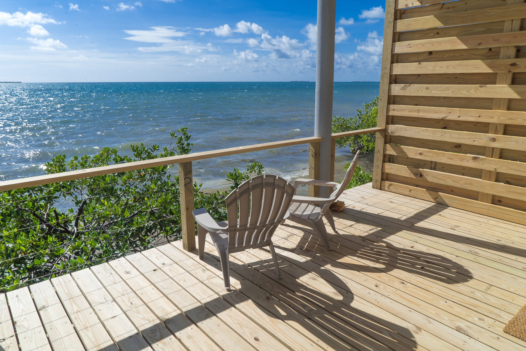 Oceanfront Cabana | Thatch Caye, a Muy'Ono Resort