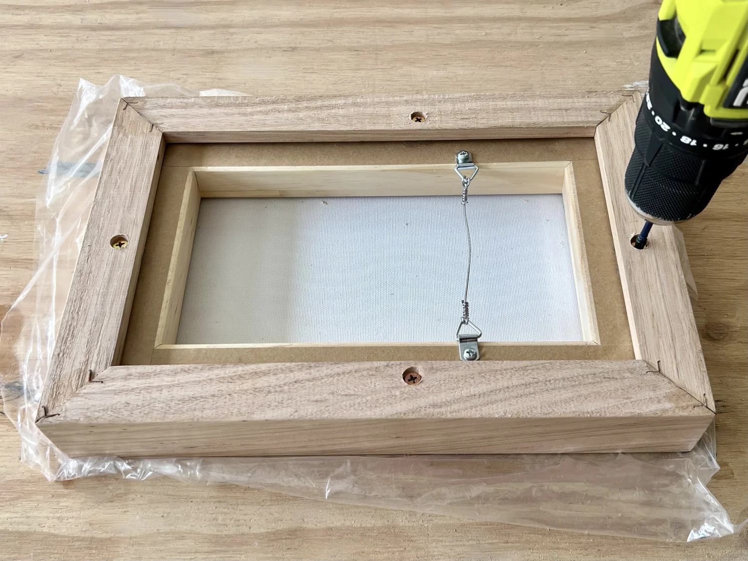 How to DIY frame a stretched canvas artwork — Little Red Industries