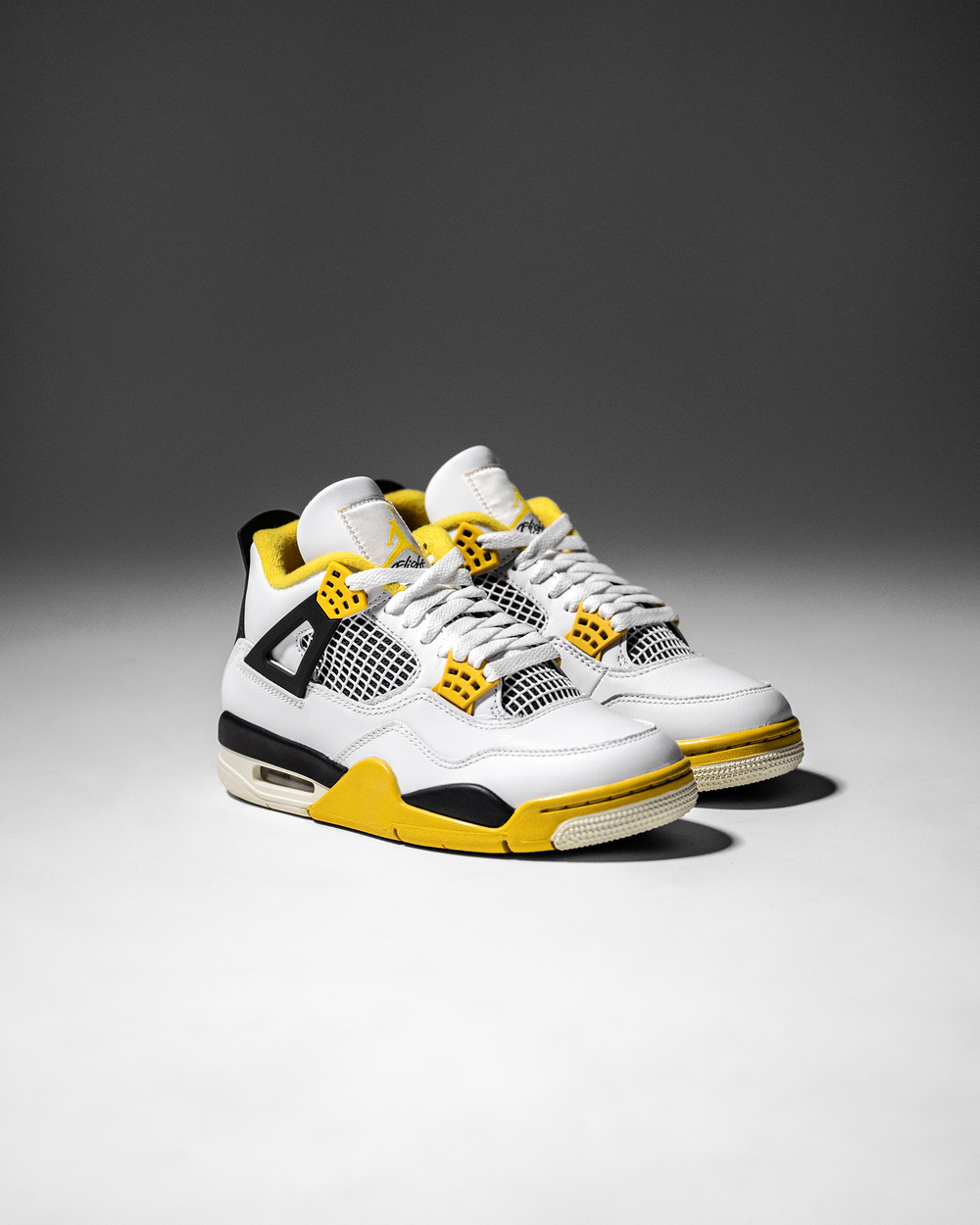 Now Available: Women's Air Jordan 4 Retro "Vivid Sulfur" — Sneaker Shouts