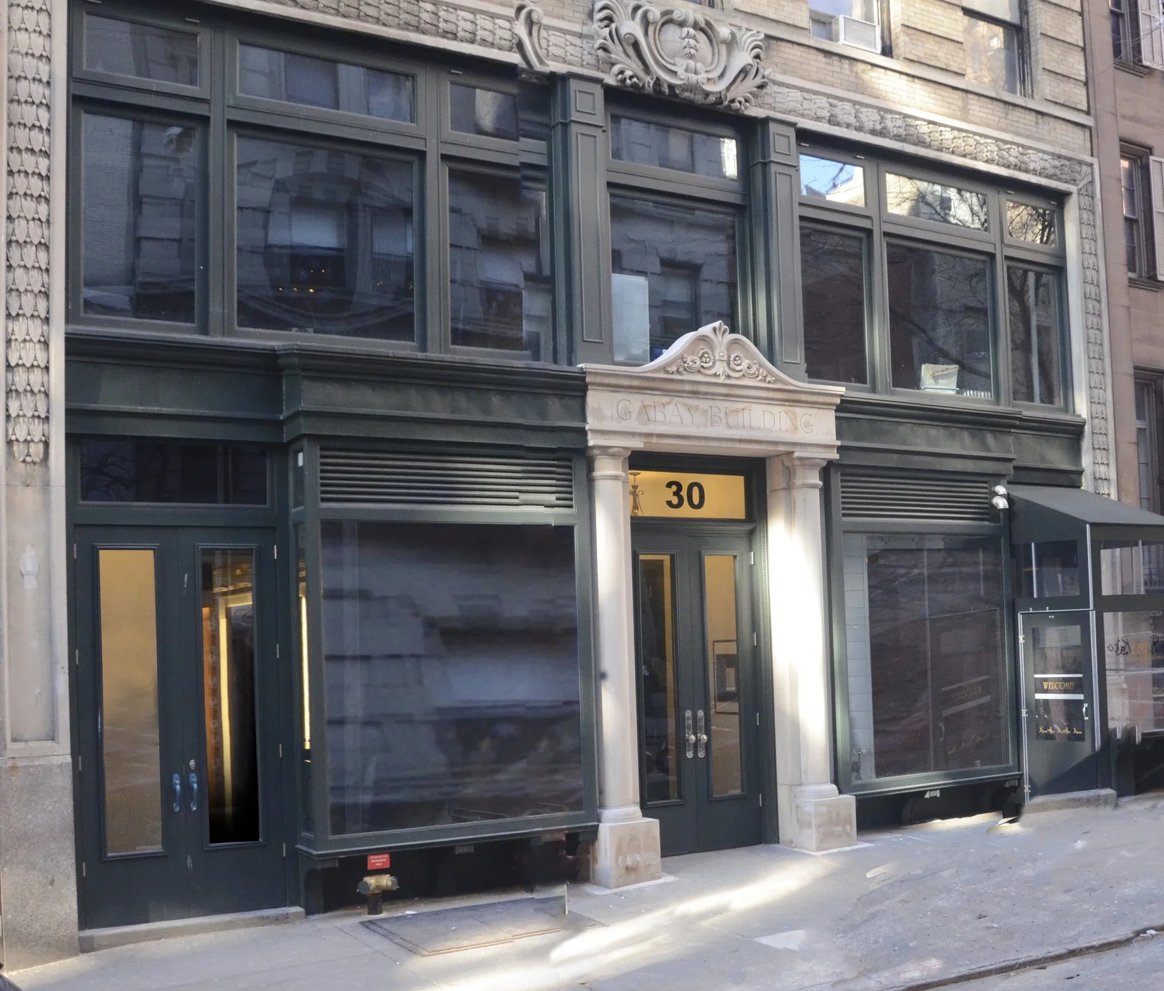 Historic Window Restoration NYC | Custom Fabricated Wood Storefront Facades