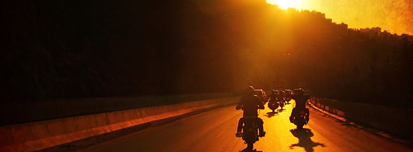 Motorcycle Riding Into Sunset