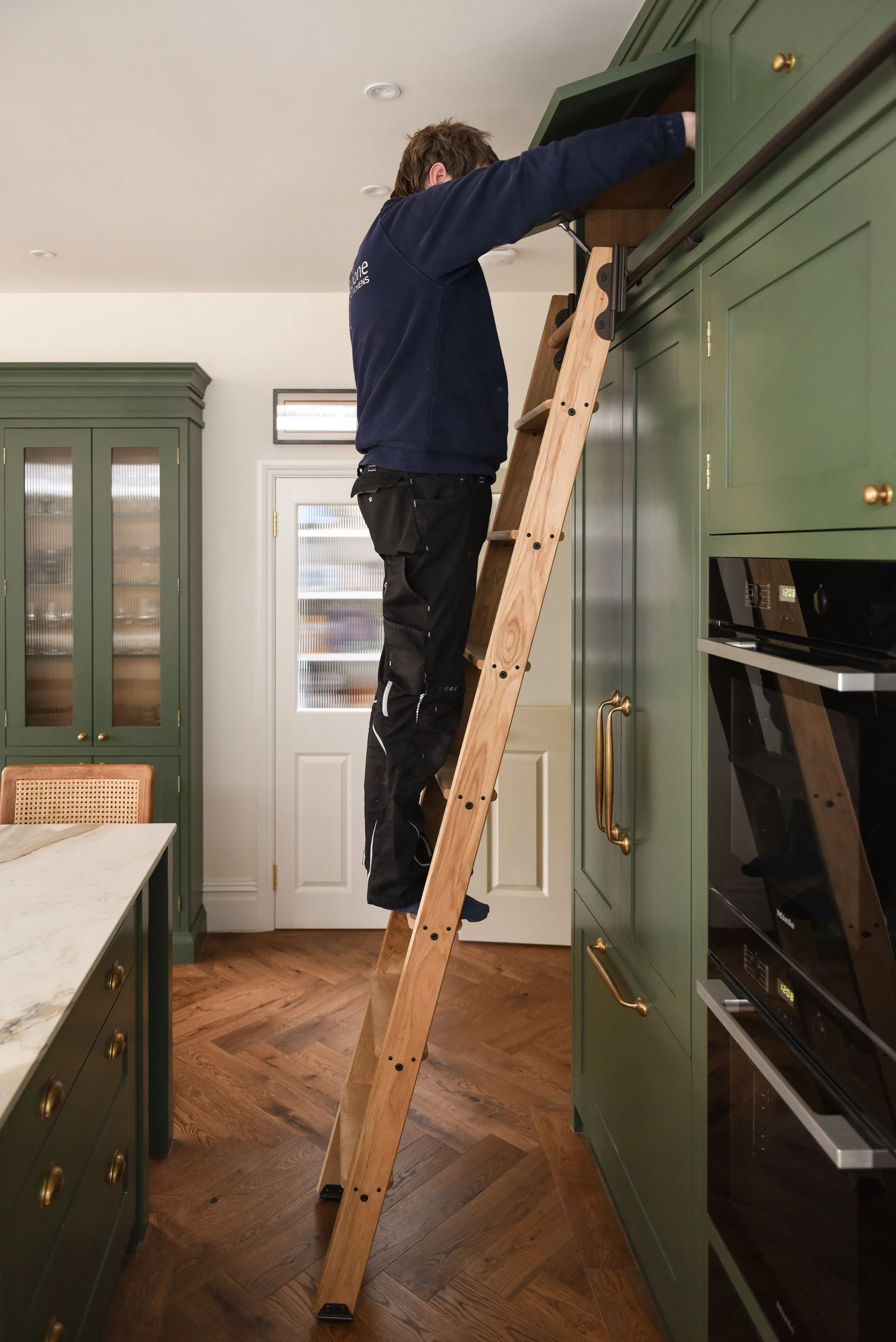 Barnes Bridge Kitchen, larder, bar & banquette seat — Herringbone House