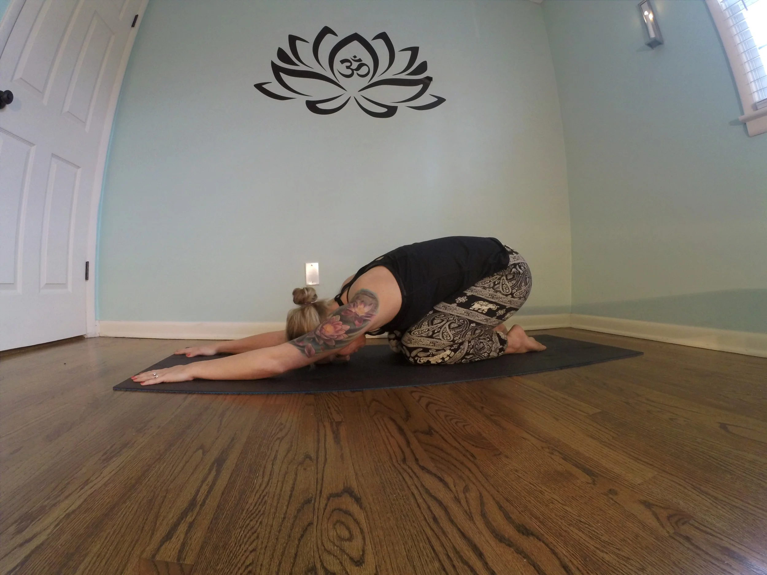 Melt anxiety with these variations of child's pose — Yoga Mama Bear