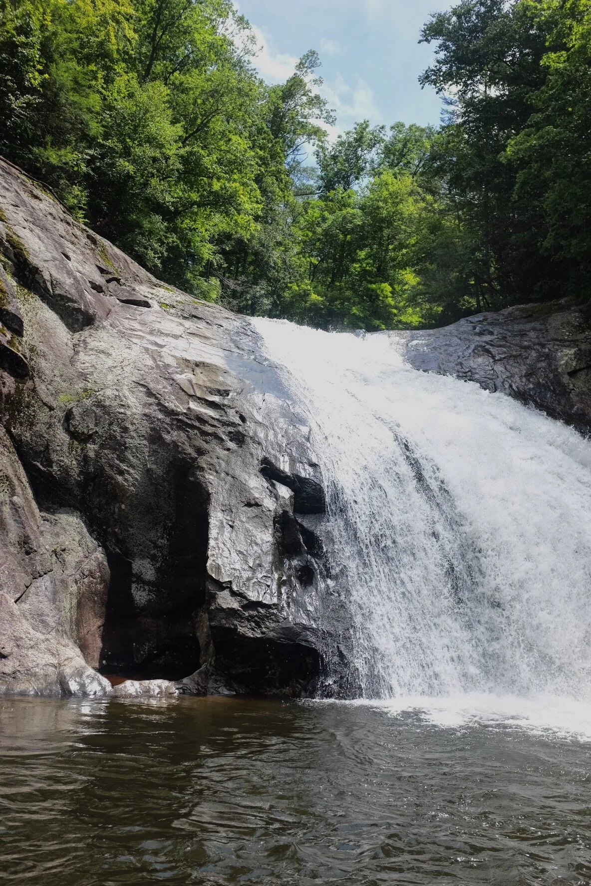 The Unexpected Light at Harpers Creek Falls — L. Raine