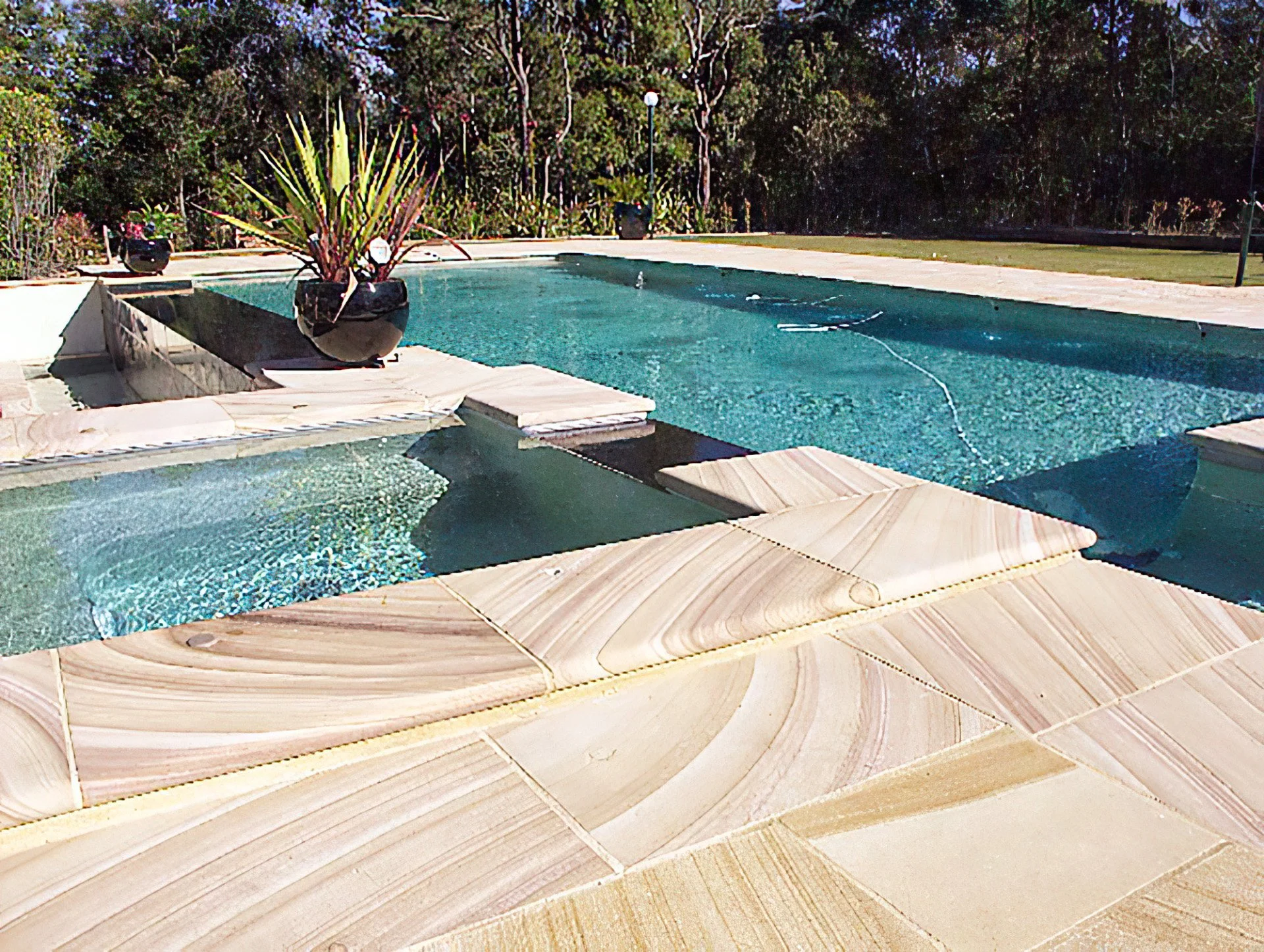 The Benefits of Using Sandstone Coping For Your Swimming Pool in 2023