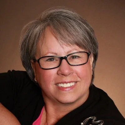 Spotlight: Designs on Forever by Susan Carlisle — What Is That Book About