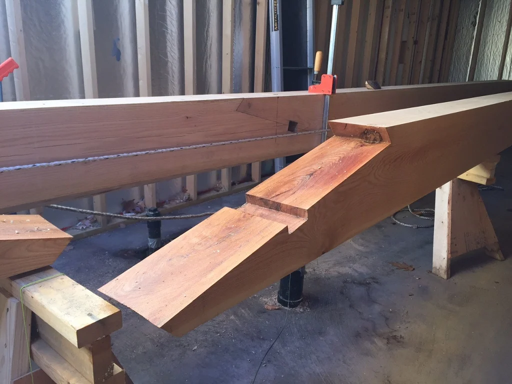 New hybrid timber frame/double stud wall home — Uncarved Block Inc.