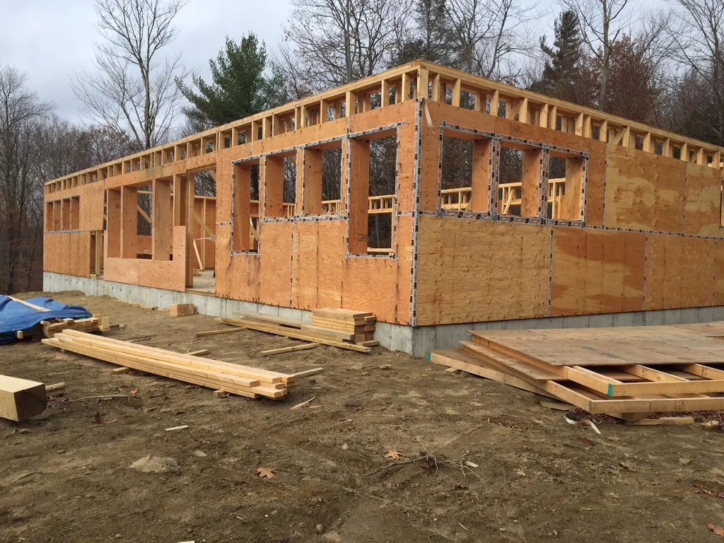 New hybrid timber frame/double stud wall home — Uncarved Block Inc.