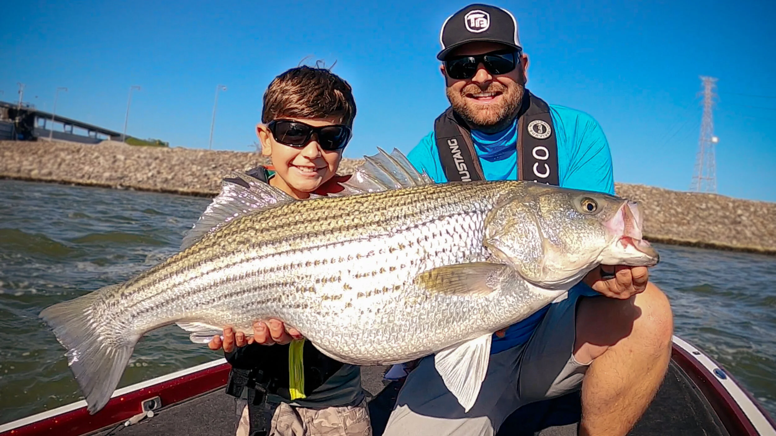 8 Year Old Kid Catches MASSIVE Fish!!! GIANT Striped Bass!!! — Tactical ...