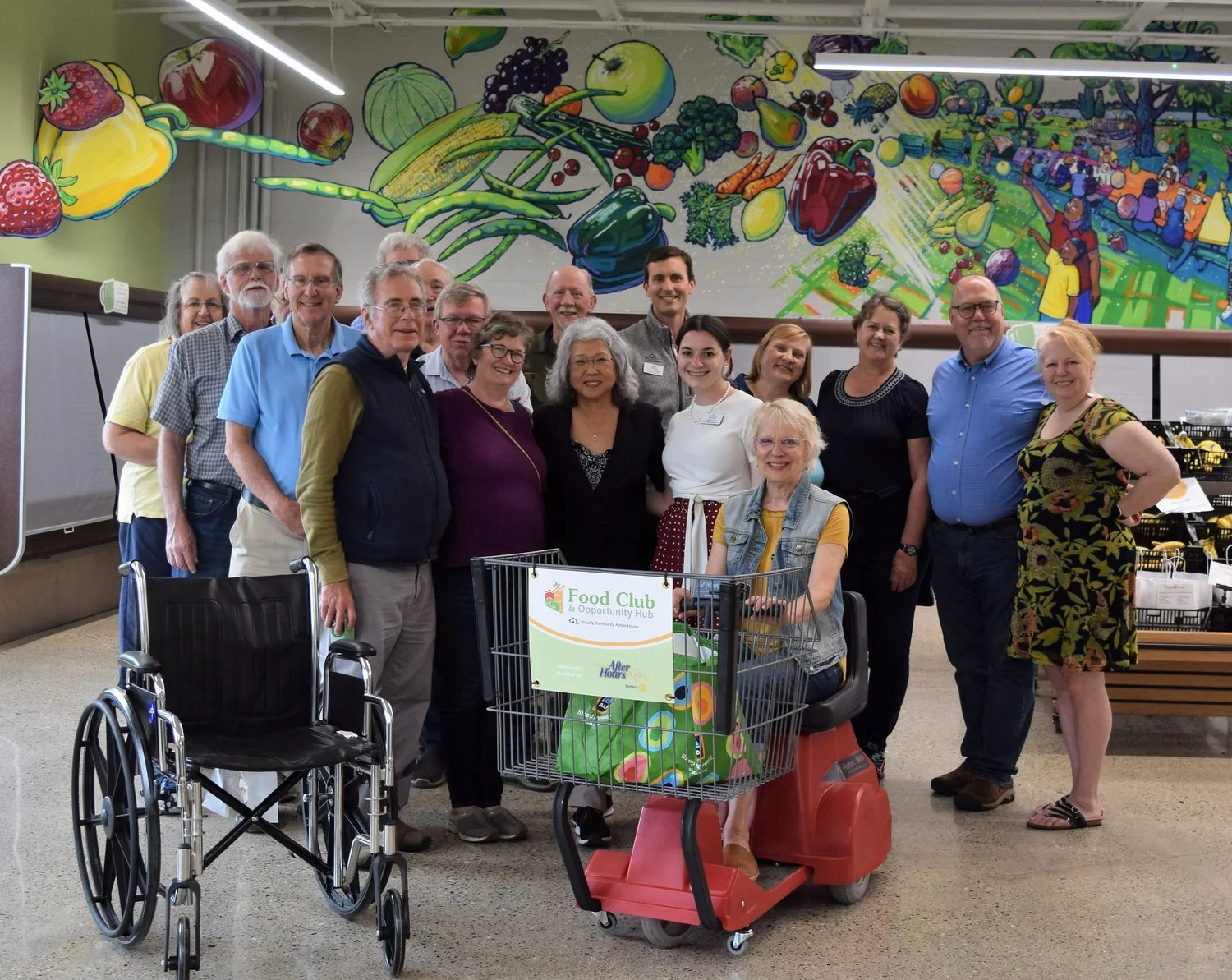 Holland Rotary Donates Motorized Shopping Cart to Community Action ...