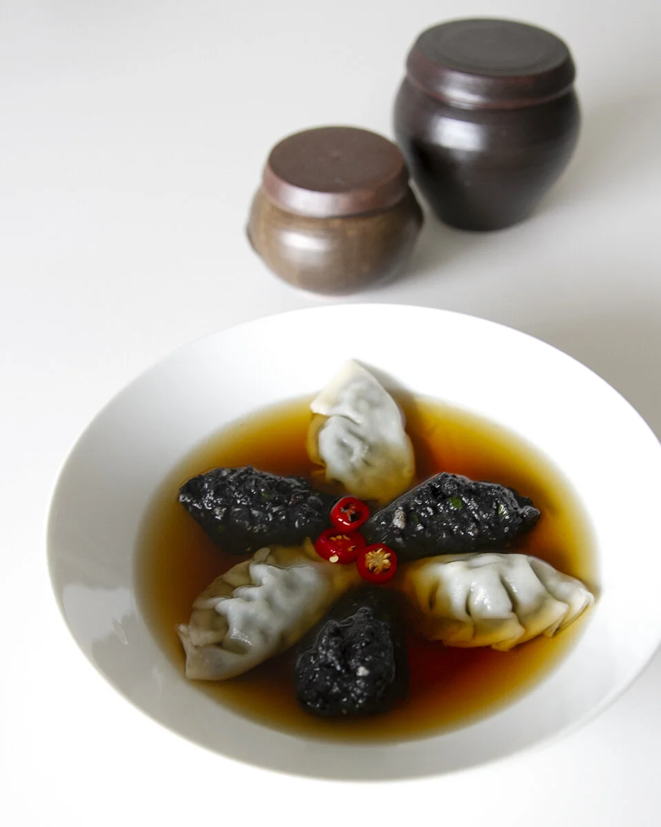 black dumplingst-square in the kitchen
