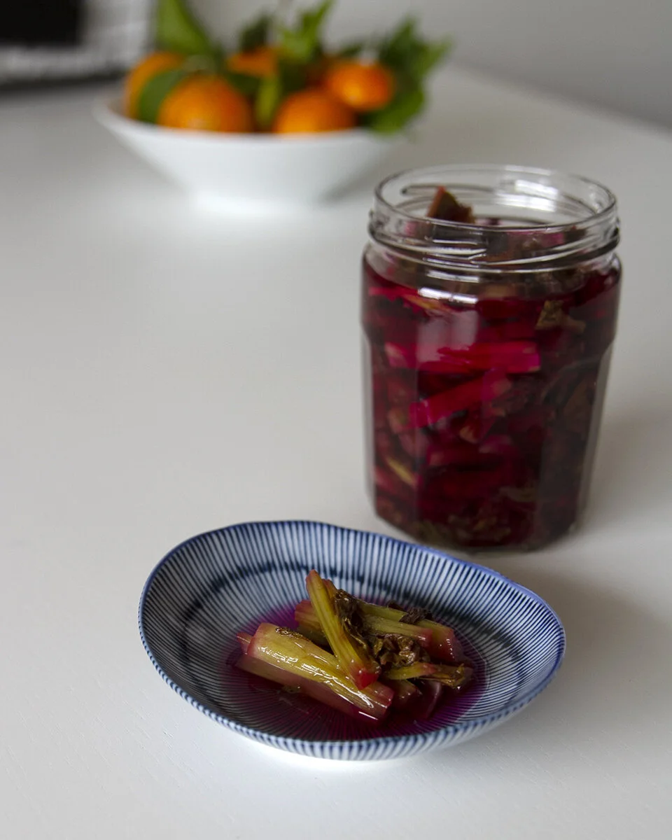 red mustard green picklet-square in the kitchen