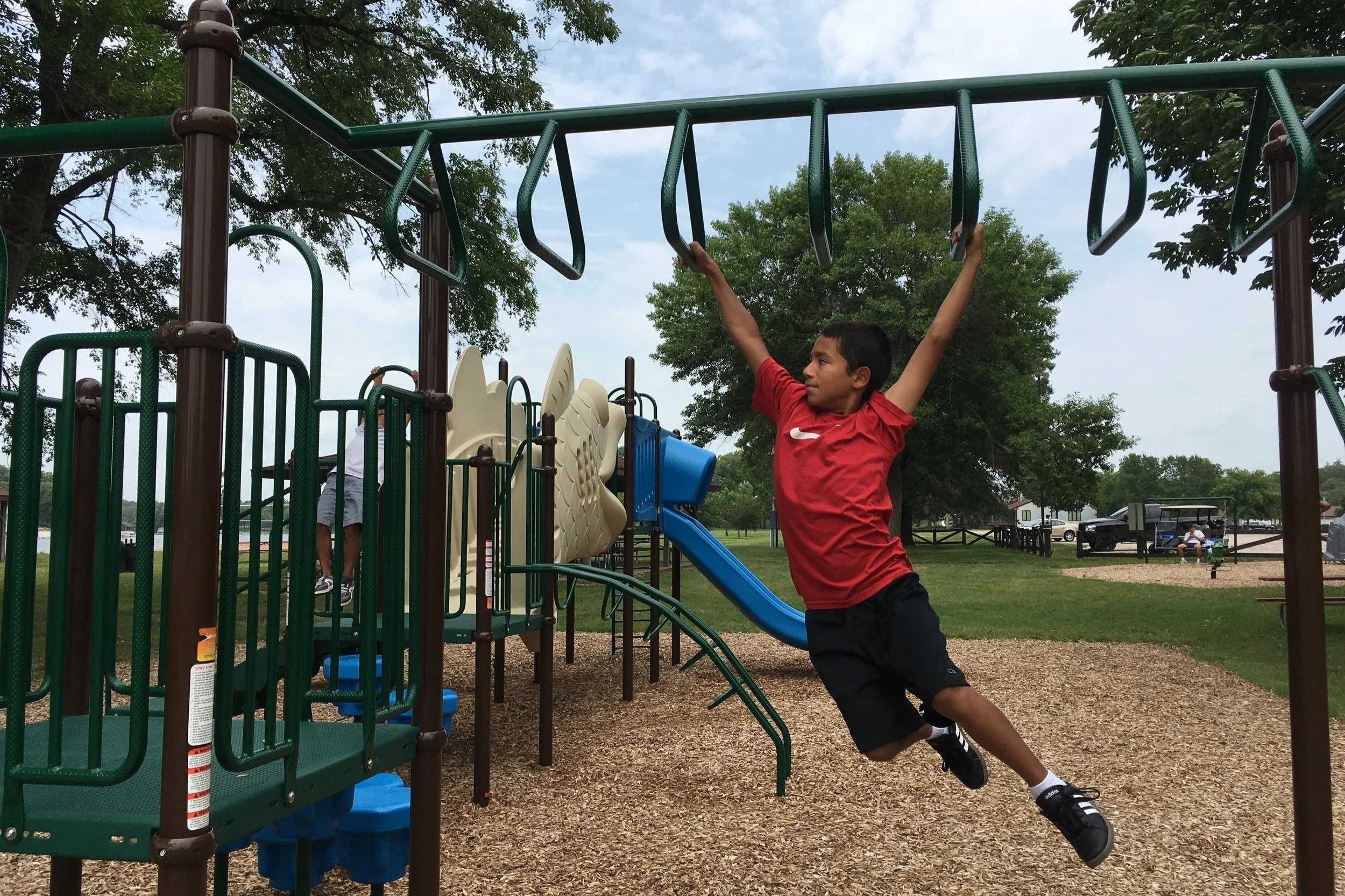 Child Alone In Playground
