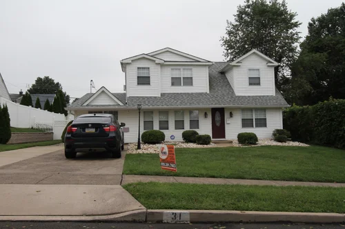 Levittown Embodied the Postwar Suburban Experiment. How's It Doing Now?