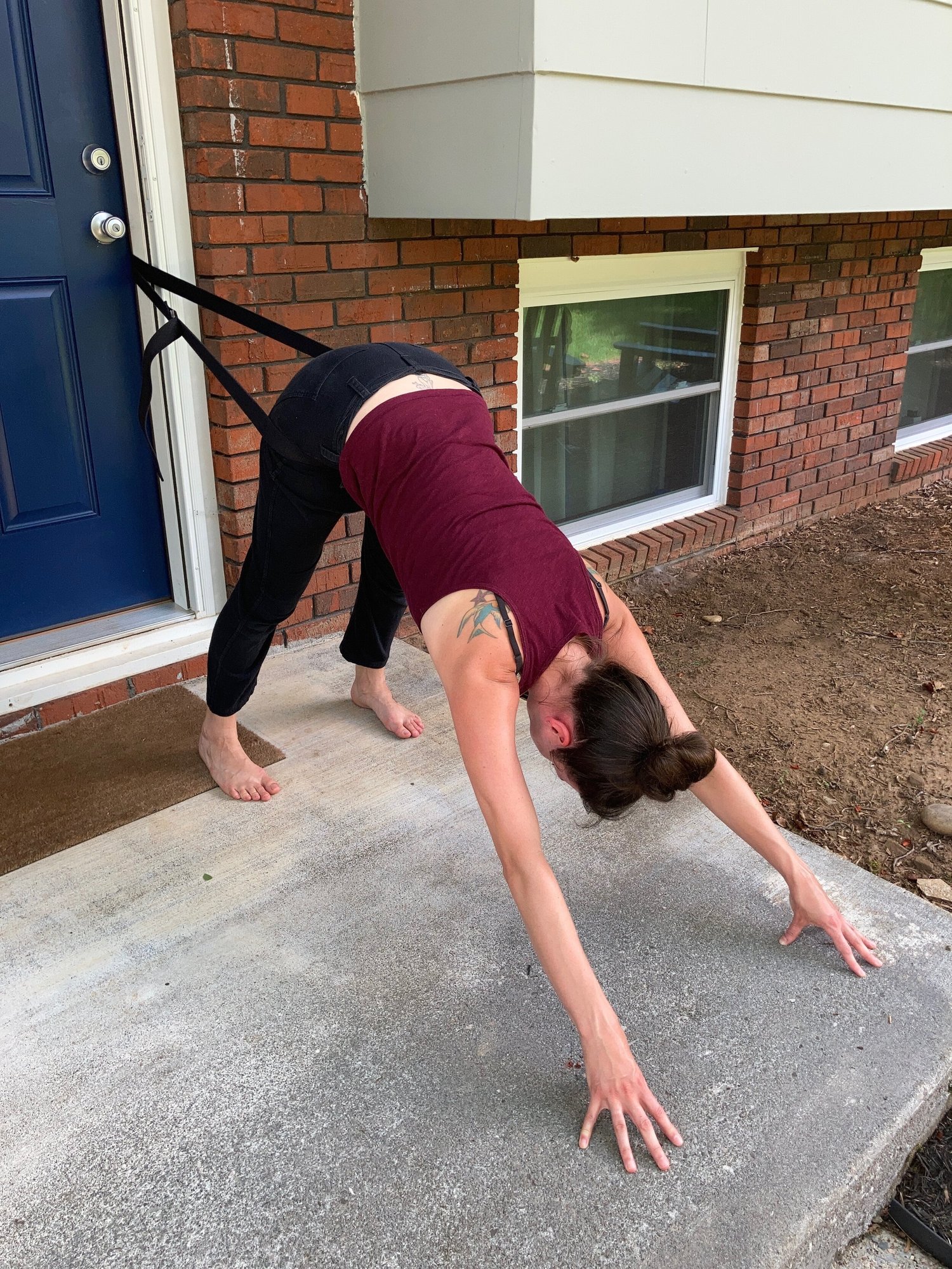 How to Use a Yoga Strap for Back Traction — KindBody Movement