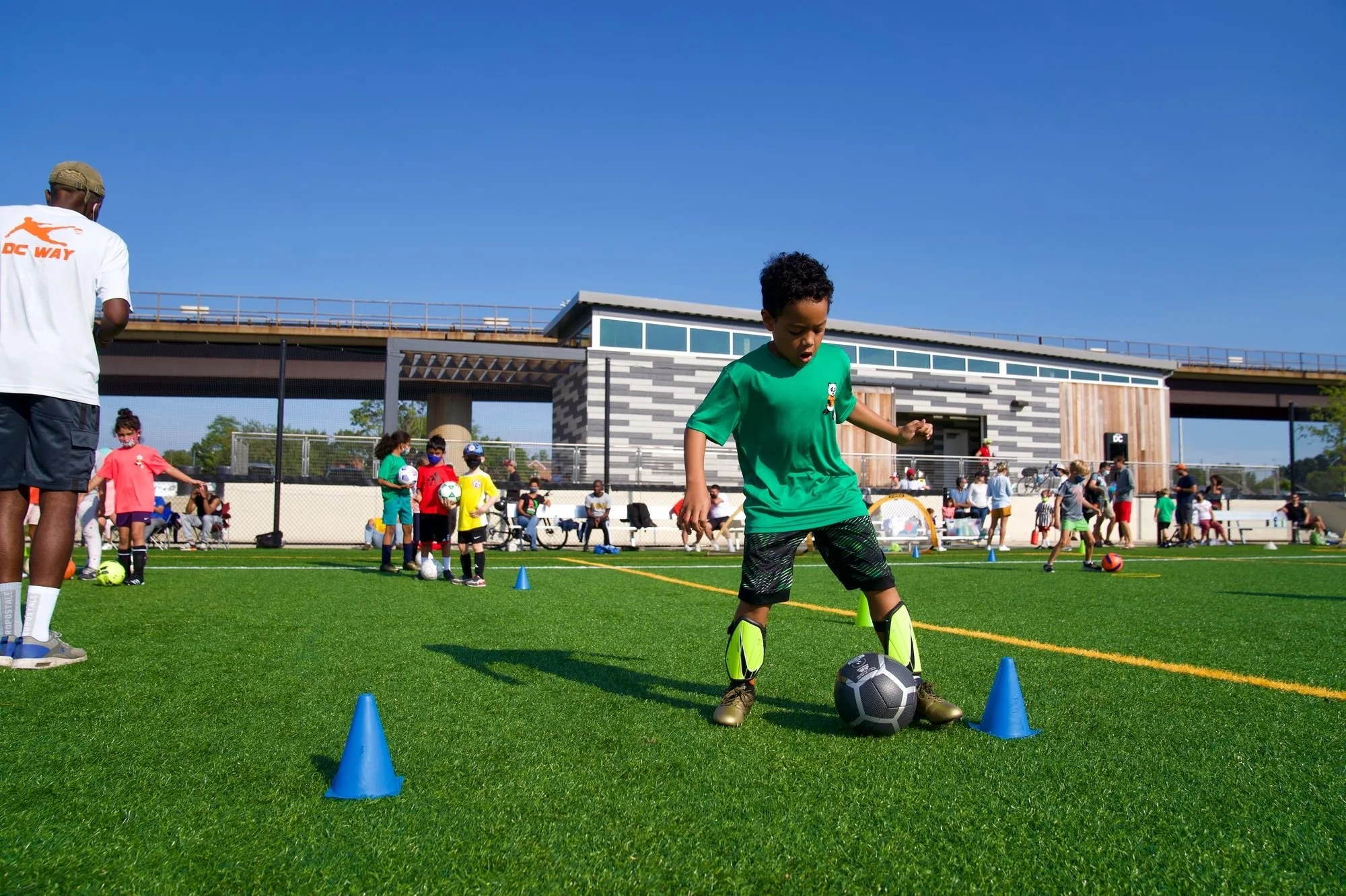 Kids Playing Soccer At School